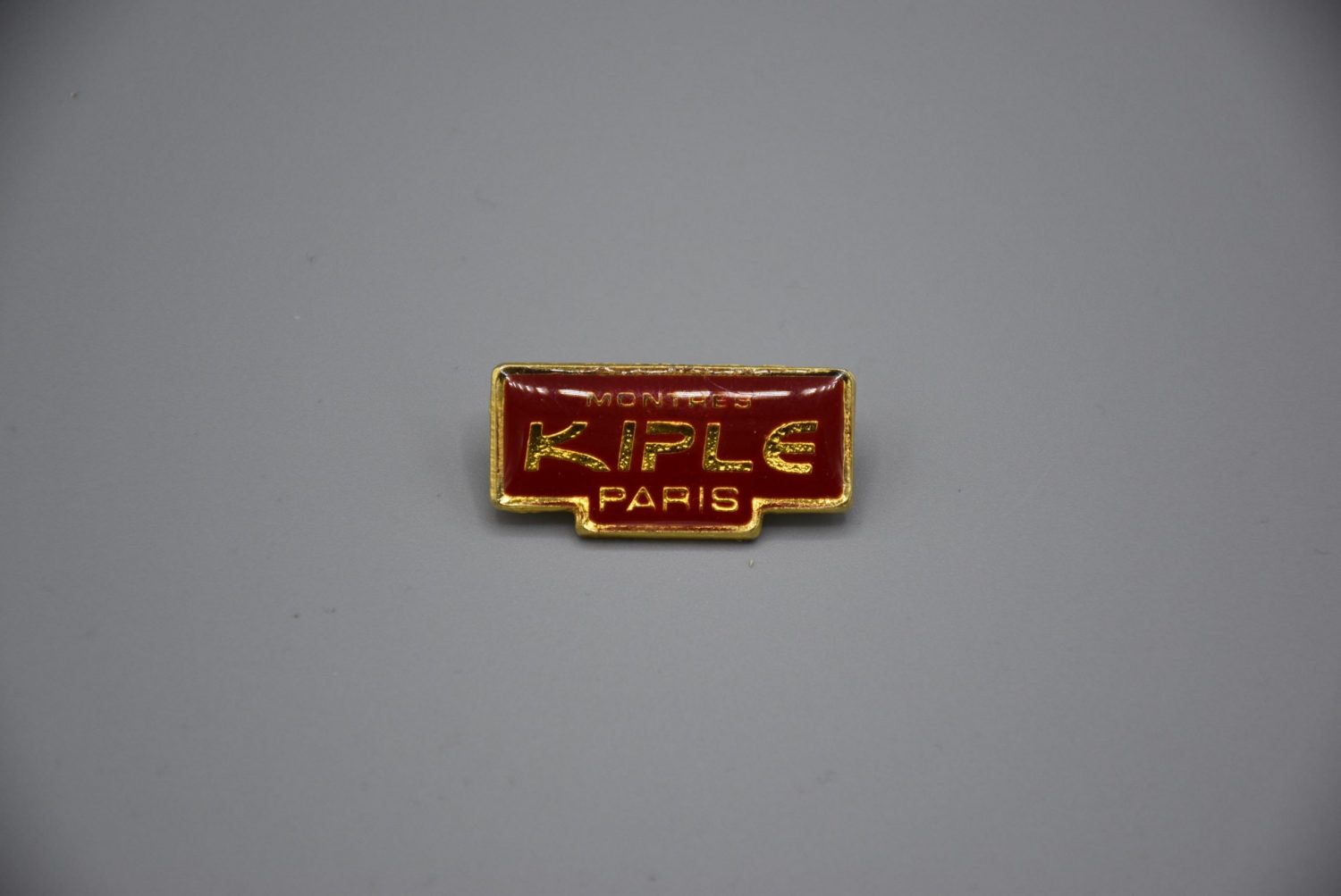 Pin's - Kiple - Horloger de Battant - Besançon - Objets Publicitaires